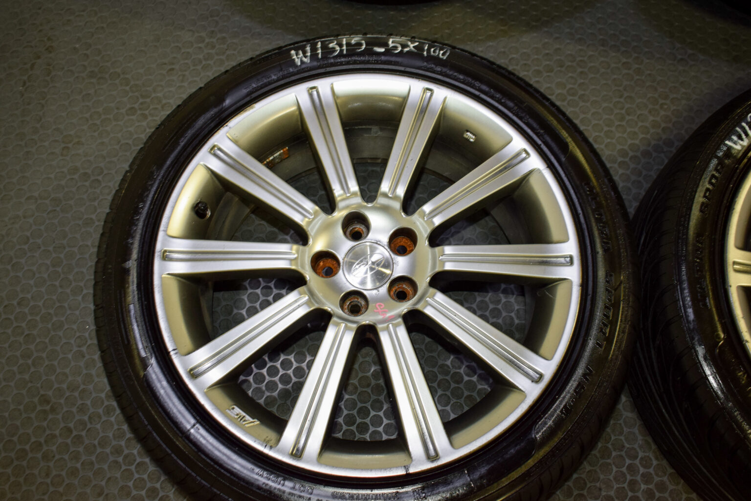 A set of four Forester STI 18 Inch Enkei wheels.