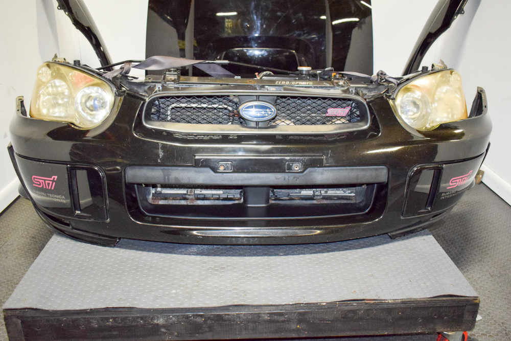 04 05 WRX STi Sedan Nose Cut in Java Black Pearl.