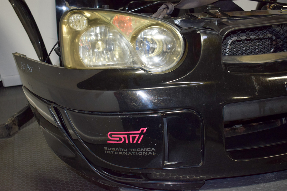 04 05 WRX STi Sedan Nose Cut in Java Black Pearl.