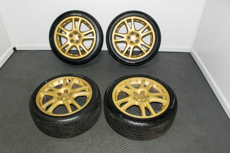 STI Enkei Gold Rims 17x7.5+48 With Brembo Caliper Clearance.