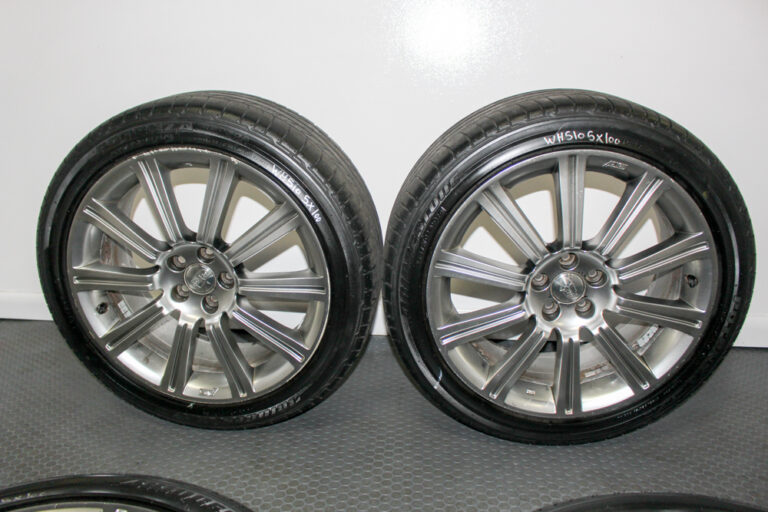A set of four Forester STI 18 Inch Enkei wheels.