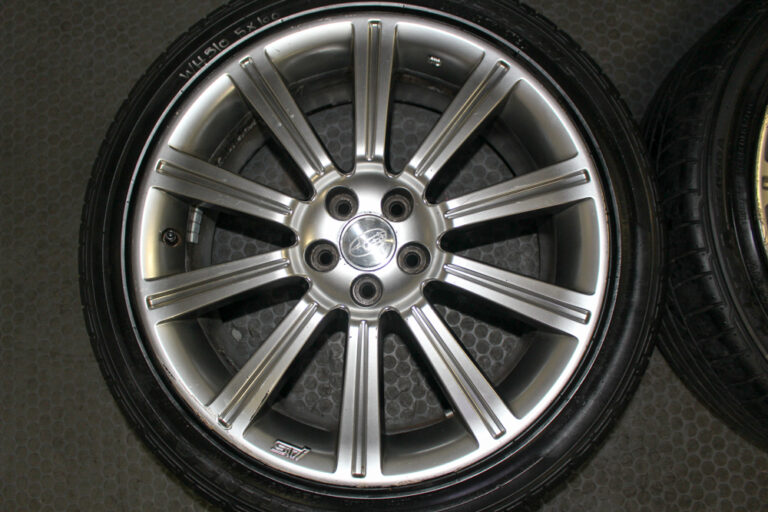 A set of four Forester STI 18 Inch Enkei wheels.