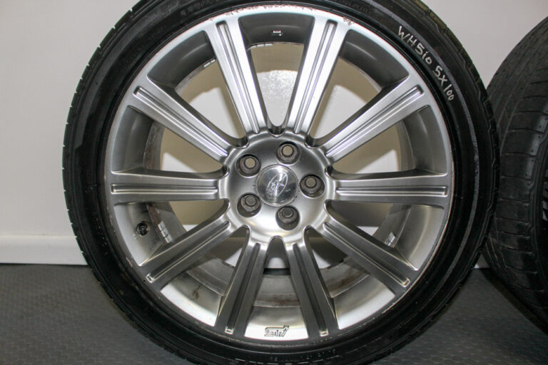 A set of four Forester STI 18 Inch Enkei wheels.